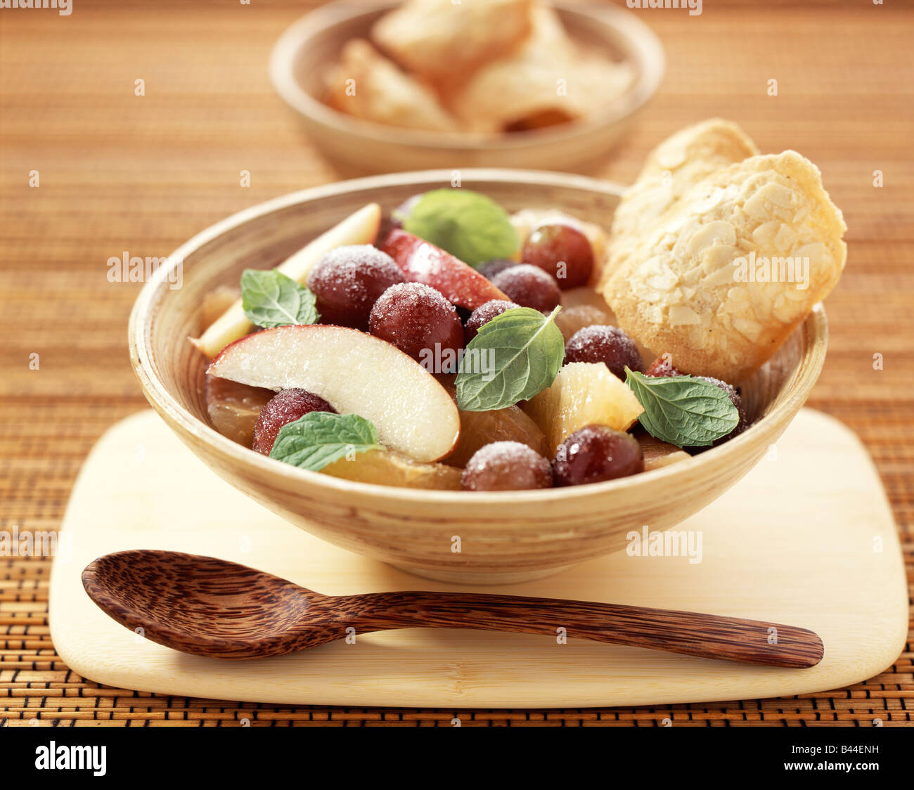 Apple,grape and grapefruit salad with almond tuile biscuits Stock Photo ...