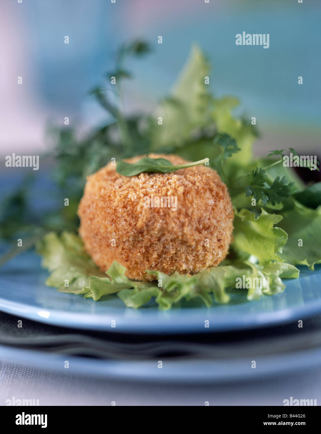 Breaded goat's cheese Stock Photo - Alamy