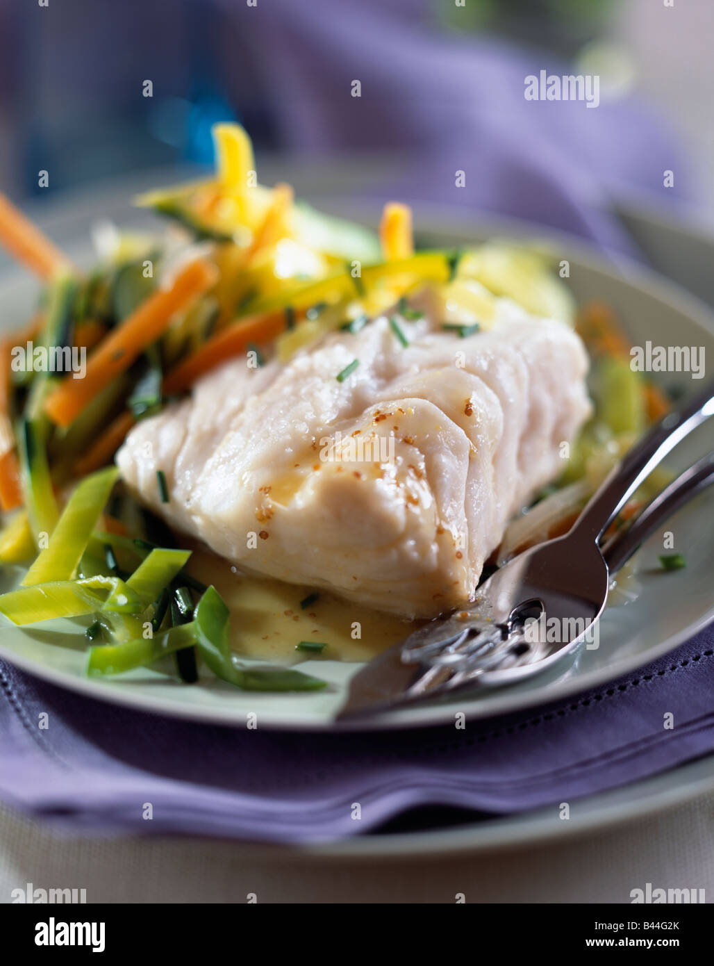 cod with baby vegetables Stock Photo - Alamy