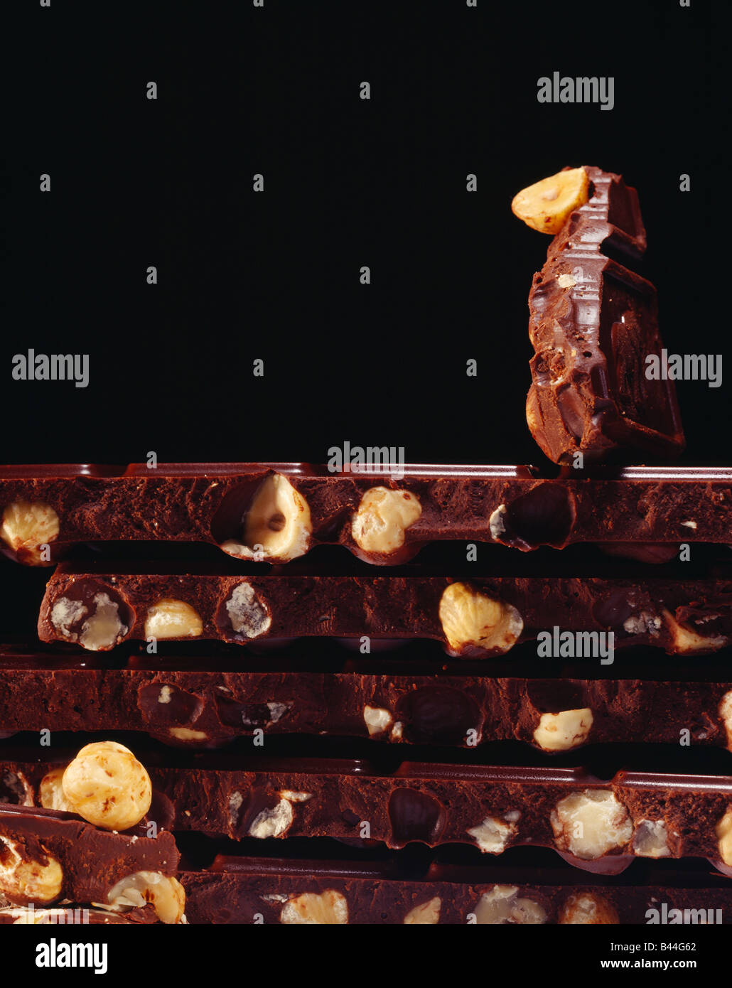 Hazelnut and dark chocolate bars Stock Photo - Alamy