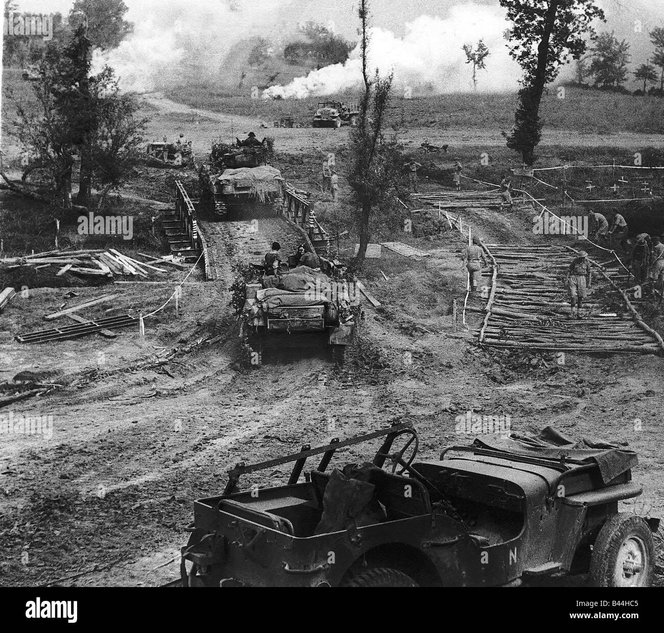British tanks cross a Bailey Bridge in Italy constructed by sappers ...