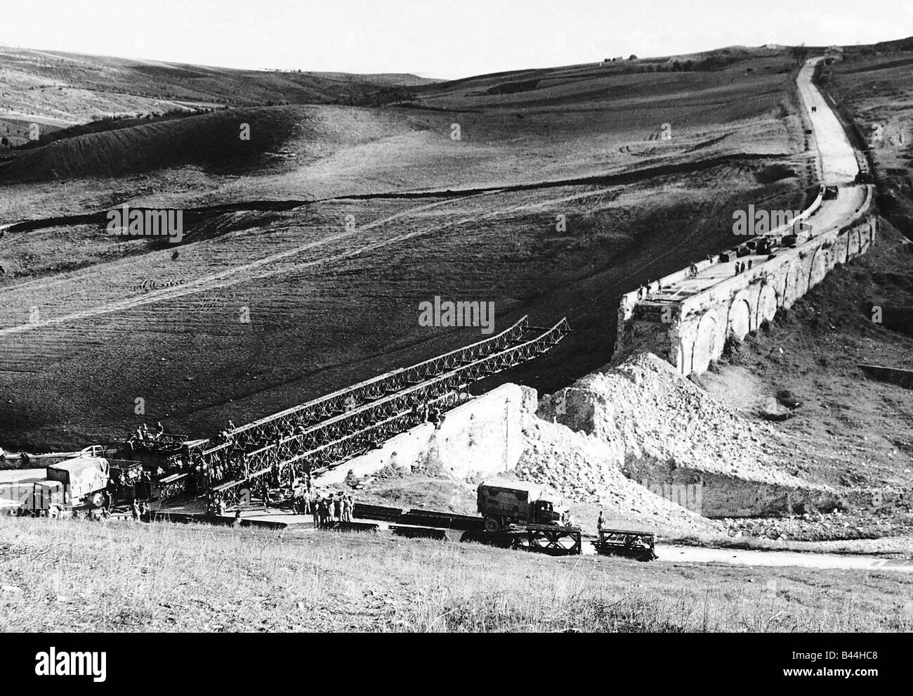 A Bailey Bridge being constructed across a viaduct which was blown up ...