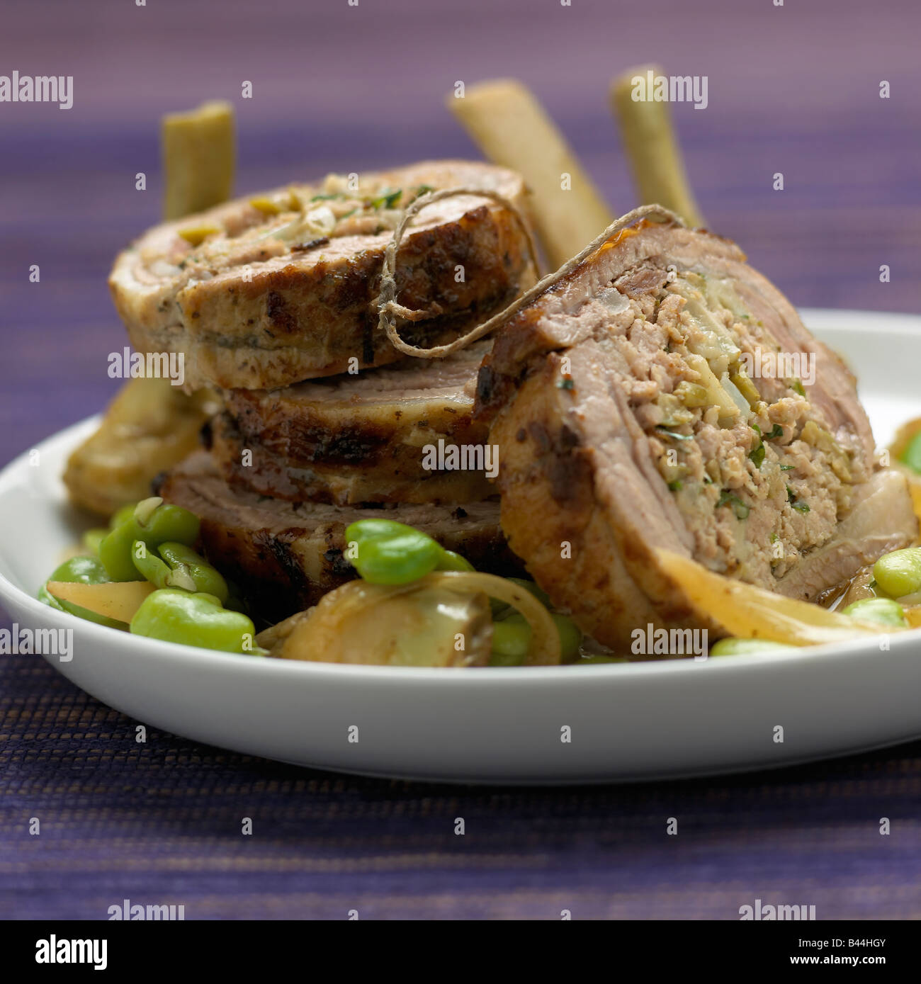 lamb roll stuffed with fresh broad beans Stock Photo - Alamy