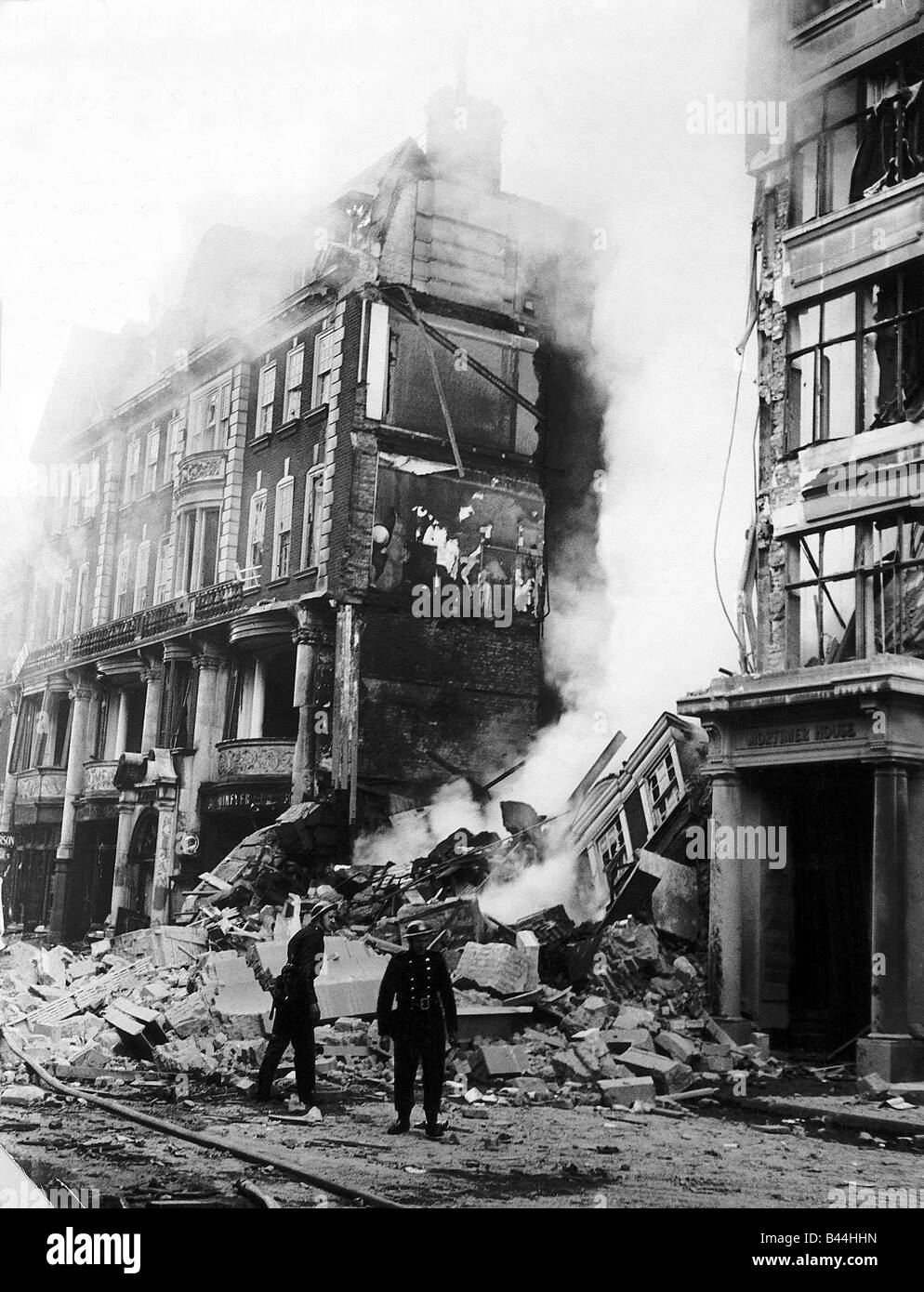ARP men in front of a building in Marylebone London which collapsed ...