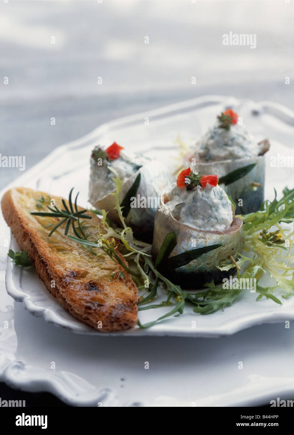 Marinated sardines with tarragon and Brocciu cheese Stock Photo - Alamy