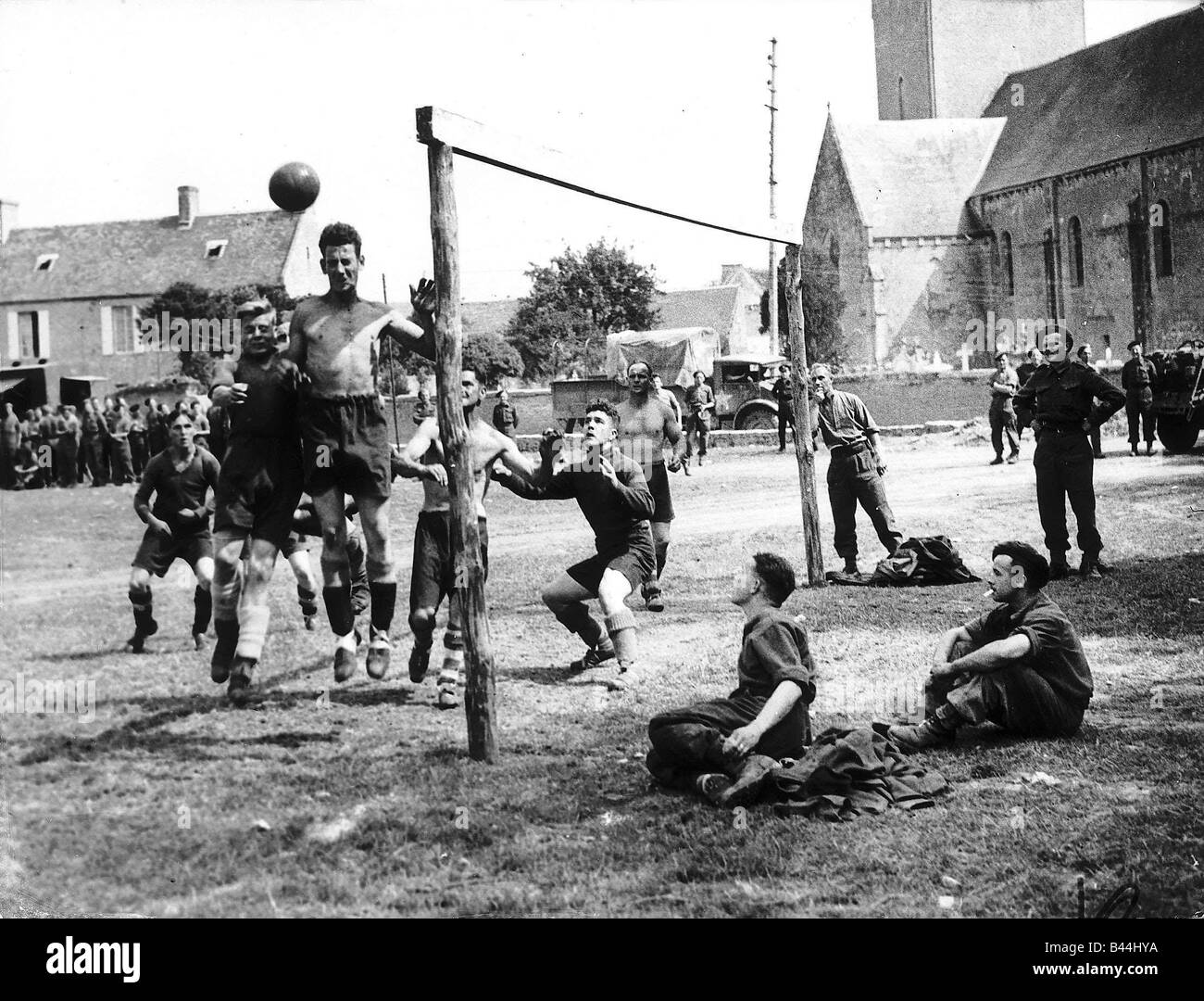 Gunners from a Royal Artillery battery in Normandy France enjoy a game ...