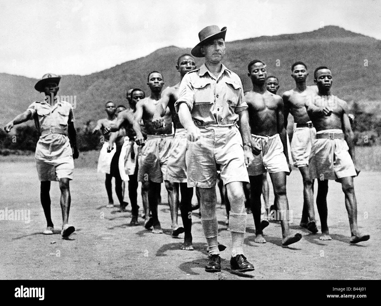 Sergeant George Thomas R A F leading West African Air Corps recruits on ...