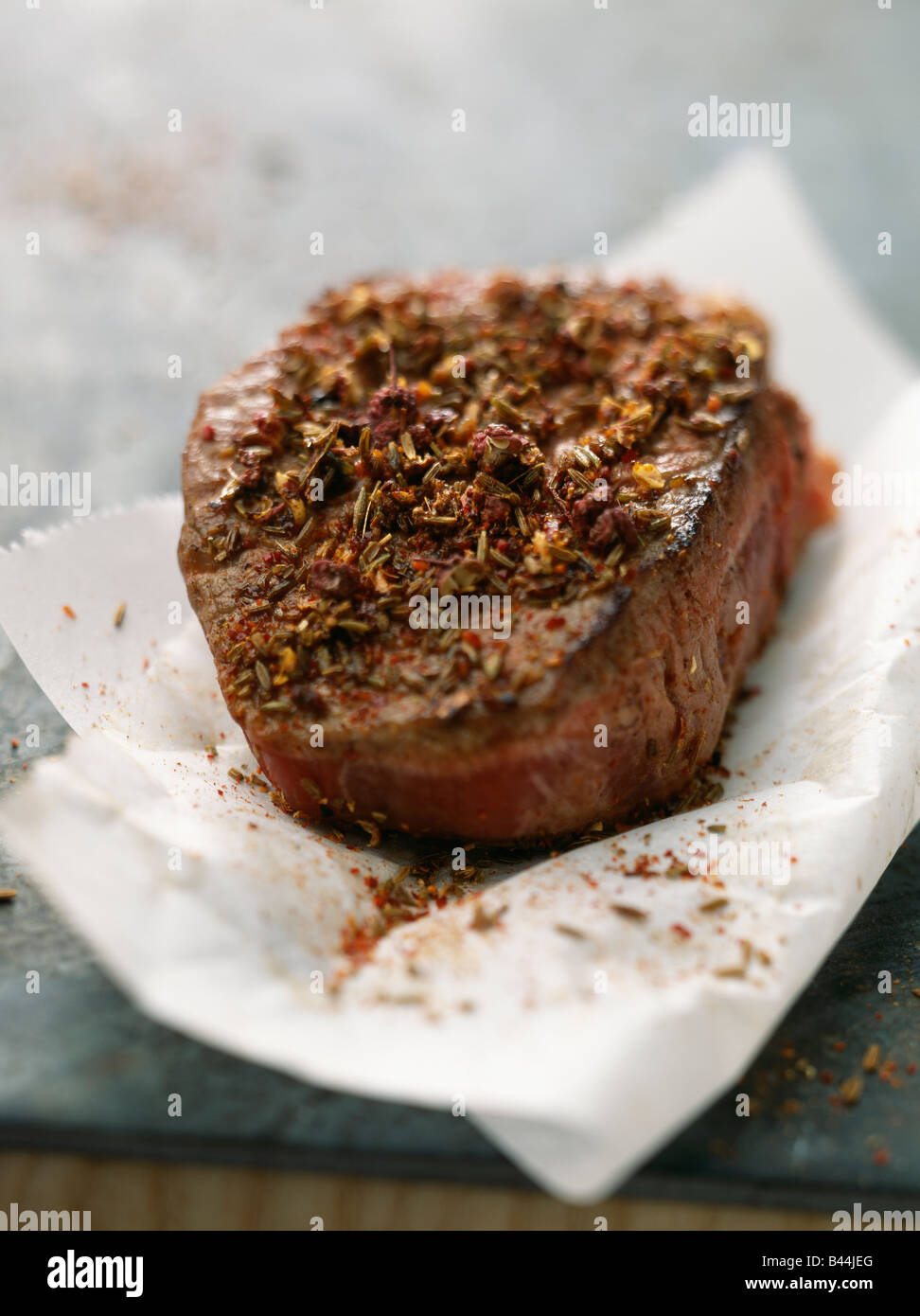 Slab of beef with spices Stock Photo - Alamy