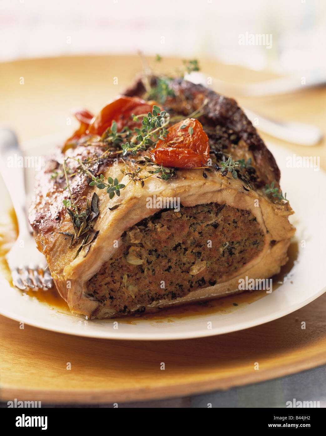Thick round fillet of lamb stuffed à la provençale Stock Photo - Alamy