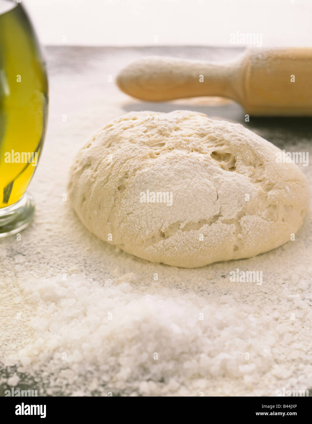 Ball of uncooked dough Stock Photo - Alamy