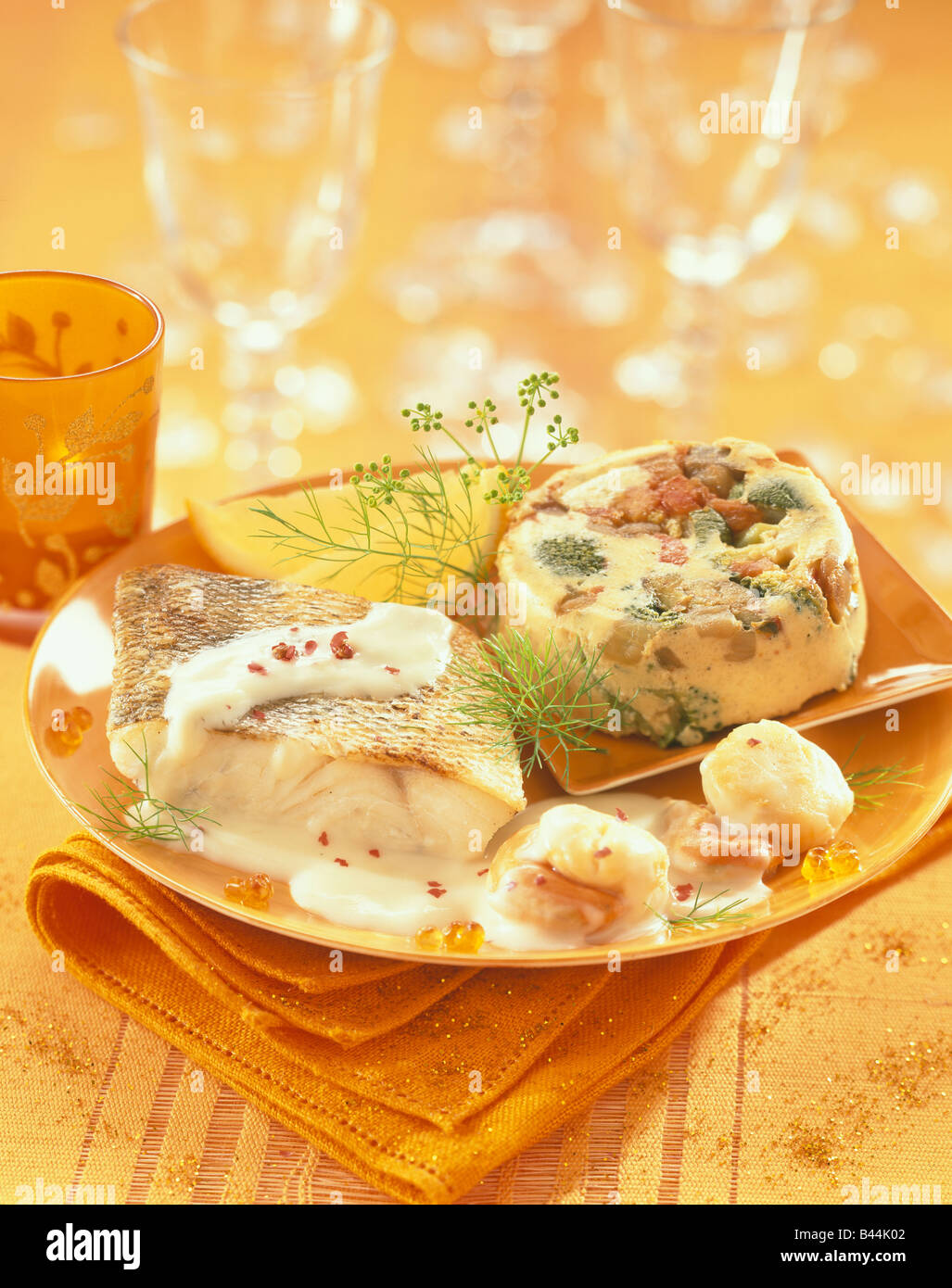 pike-perch fillet, scallops and vegetable cake Stock Photo - Alamy