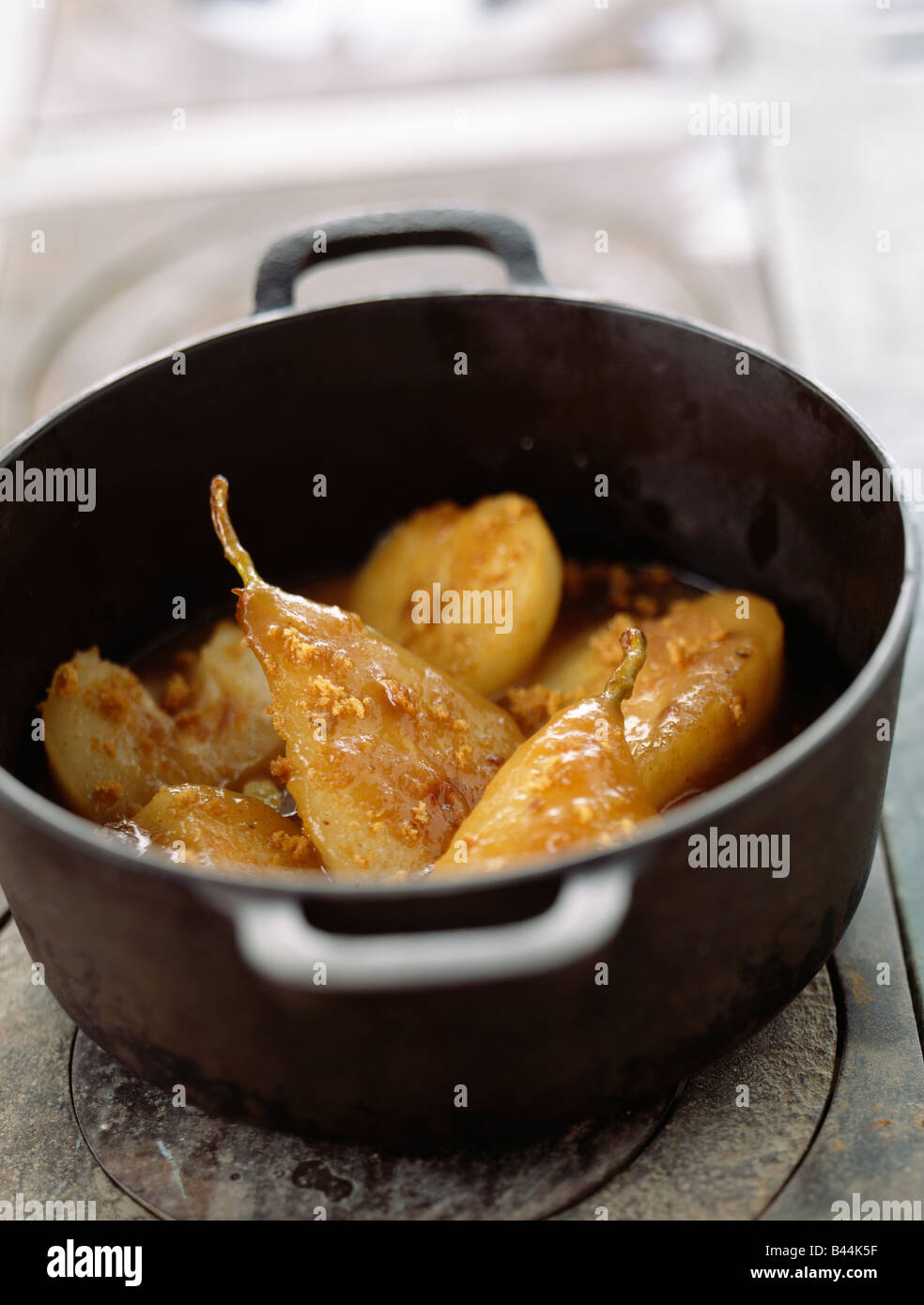 Pears and gingerbread in casserole dish Stock Photo - Alamy