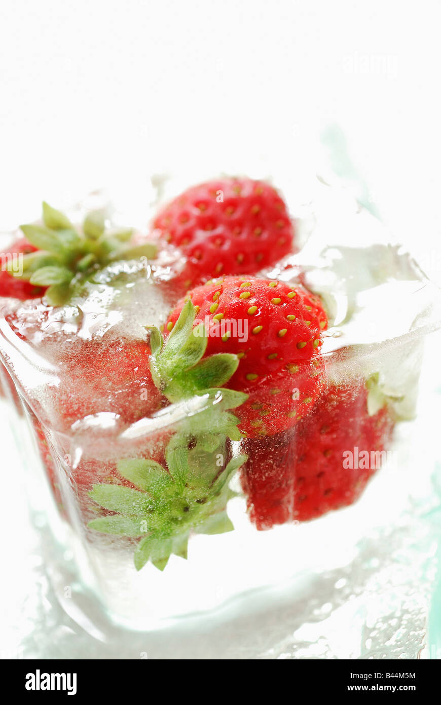 Strawberry ice cube Stock Photo - Alamy