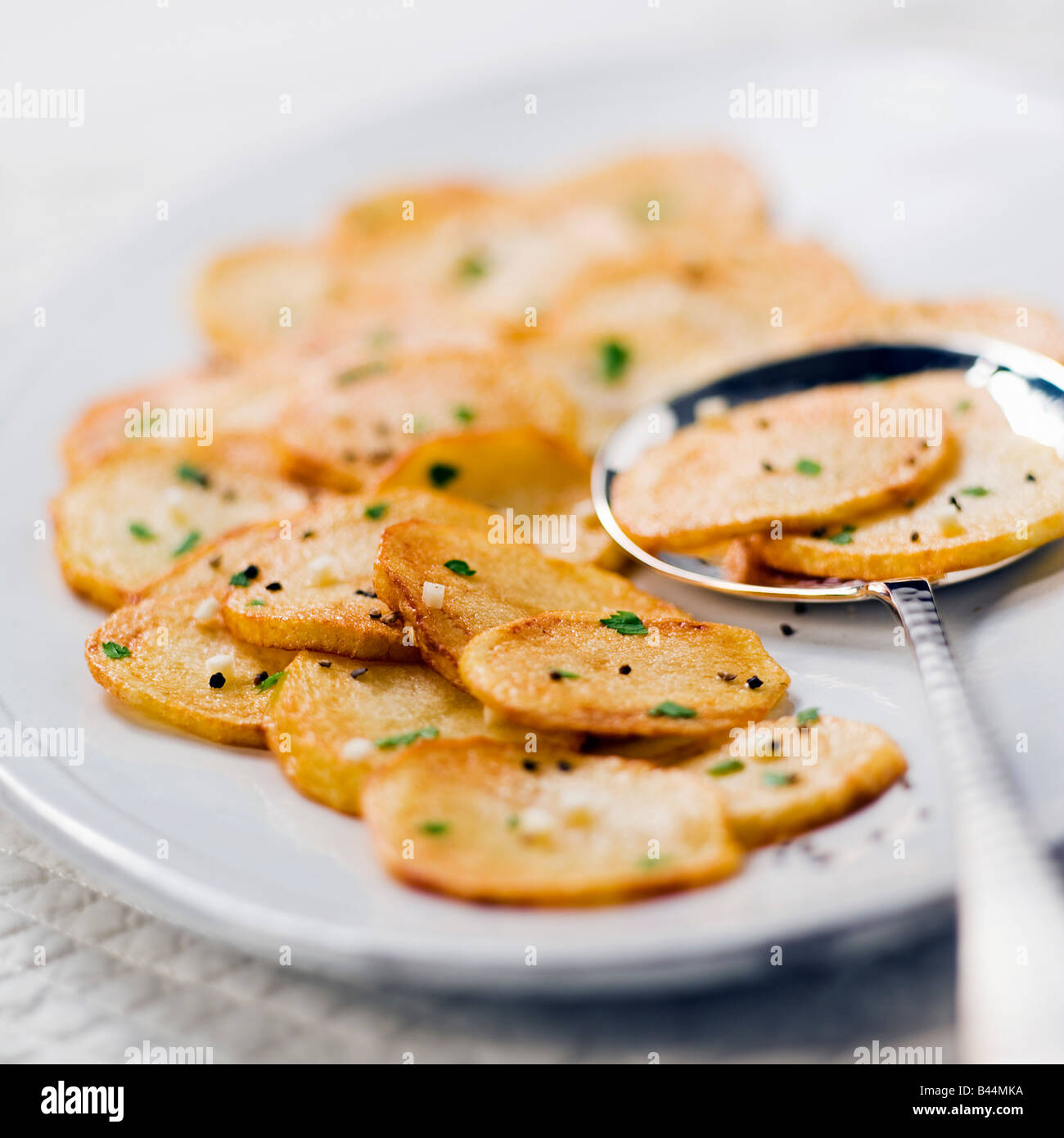 Pan-fried potatoes à la salardaise Stock Photo - Alamy