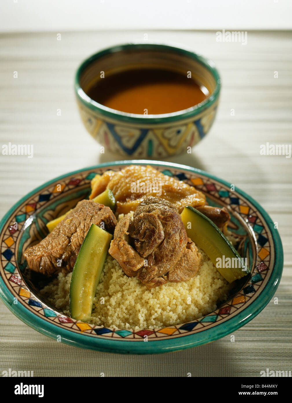 Three meat couscous Stock Photo - Alamy