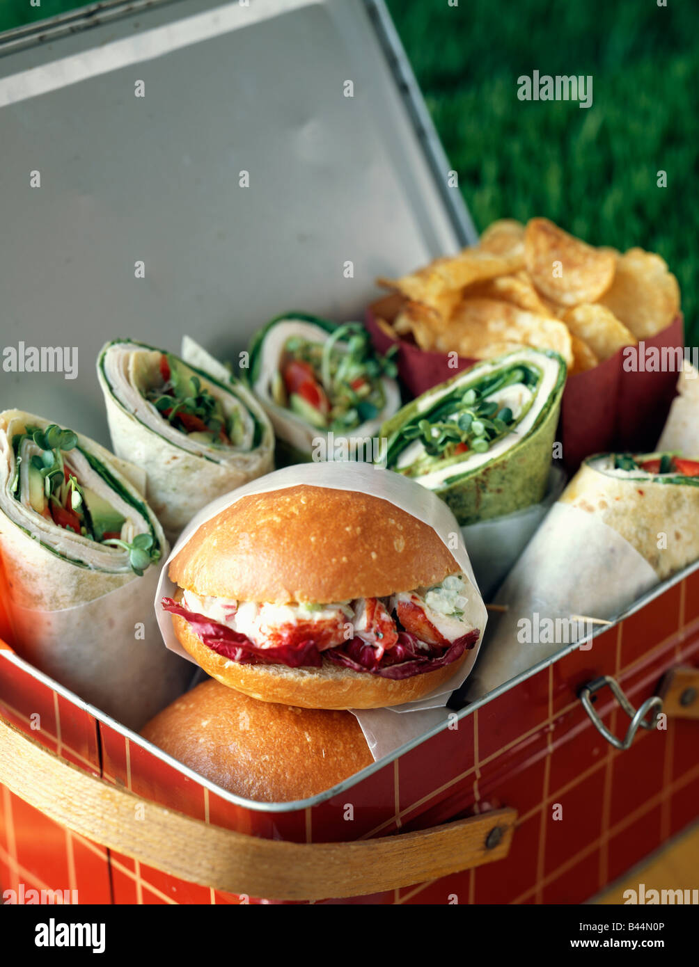 Picnic basket;pan bagna,tortillas and chips Stock Photo - Alamy