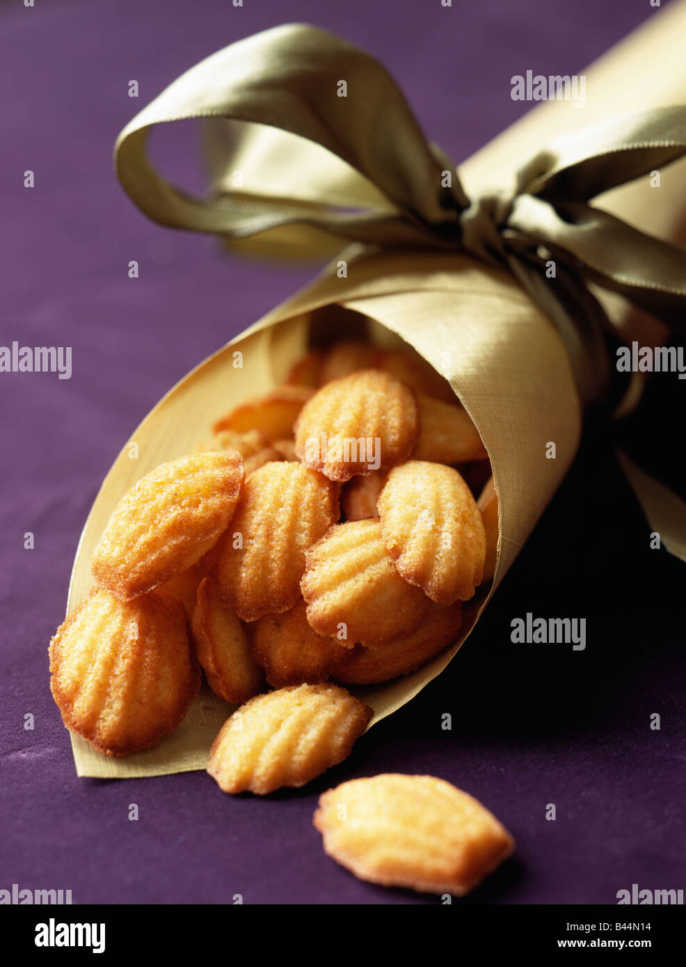 paper cone of mini madeleines Stock Photo - Alamy