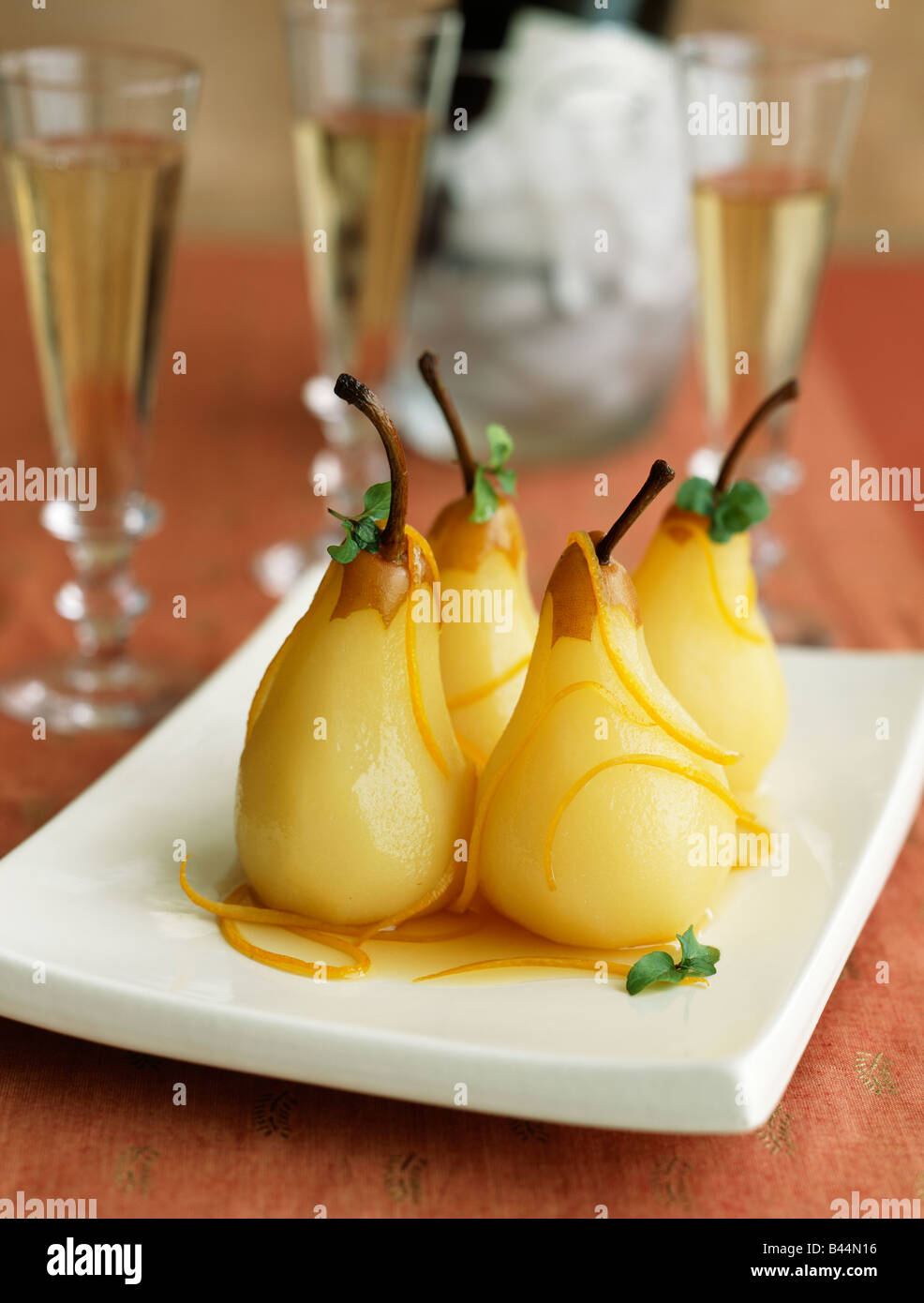 Pears poached with orange Stock Photo - Alamy