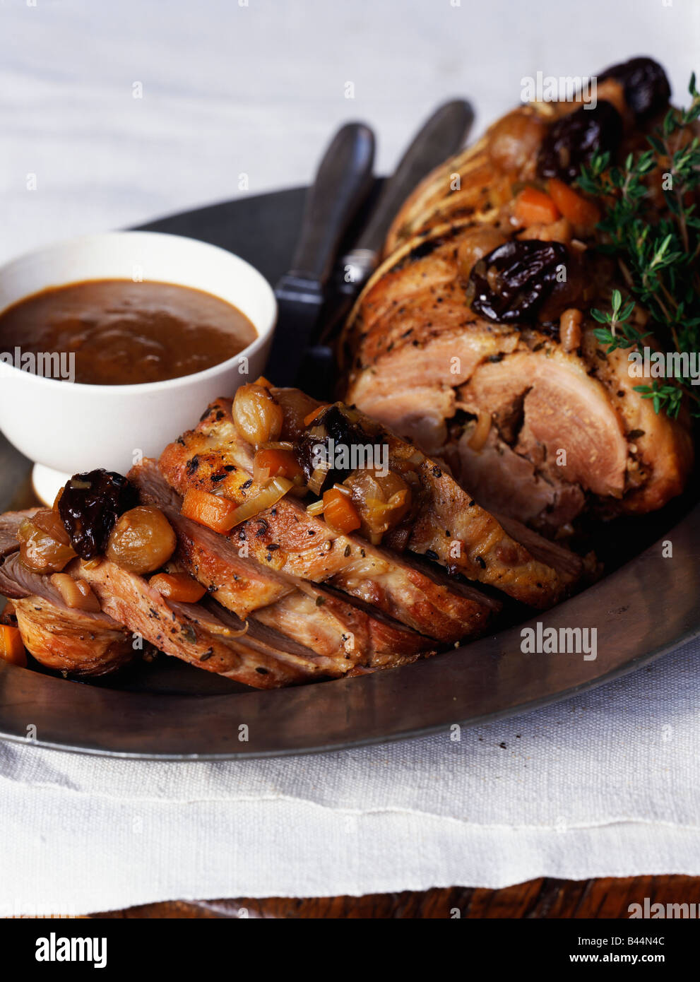 Roast pork stuffed with prunes Stock Photo - Alamy
