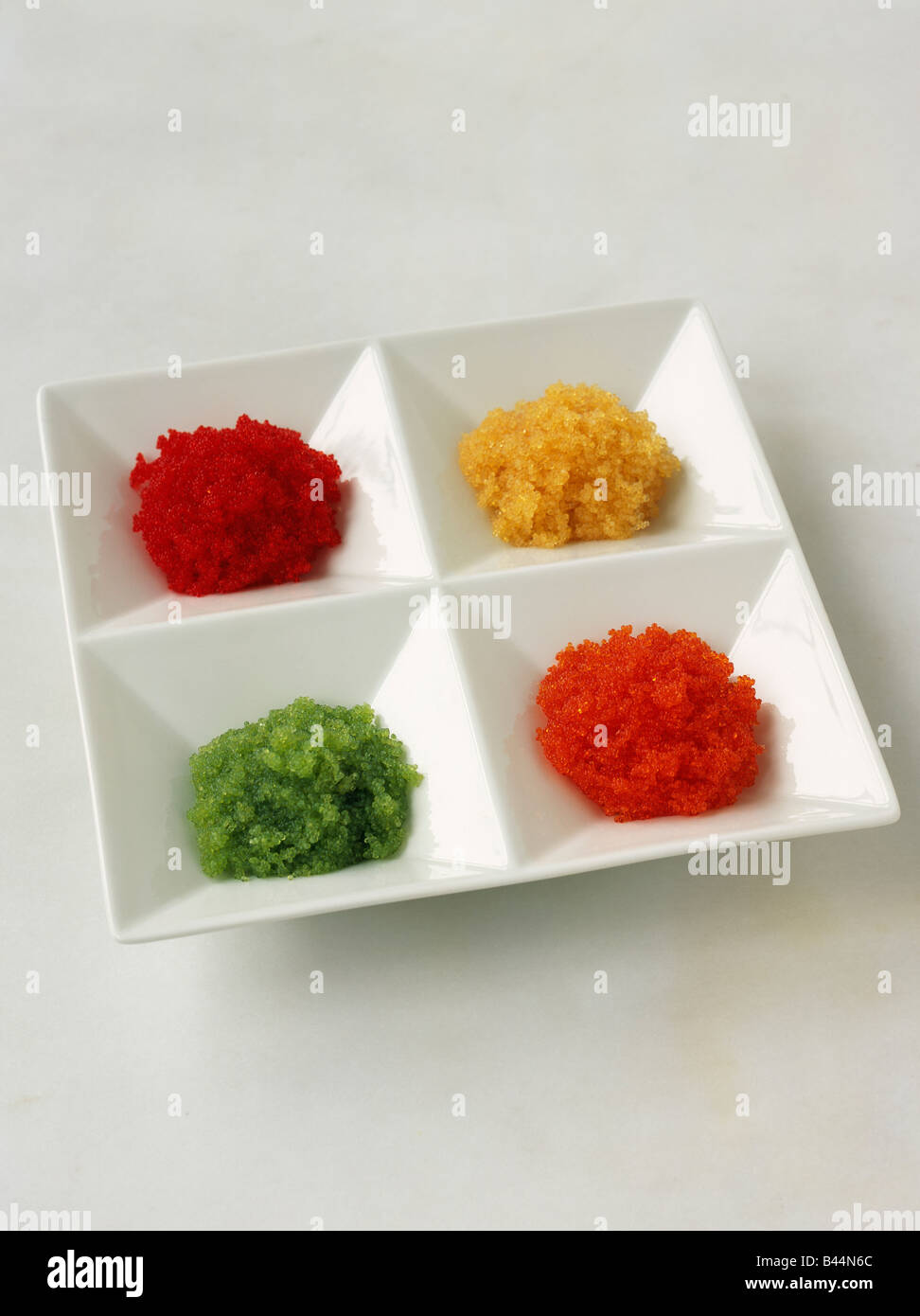 Selection of different coloured fish roe Stock Photo - Alamy