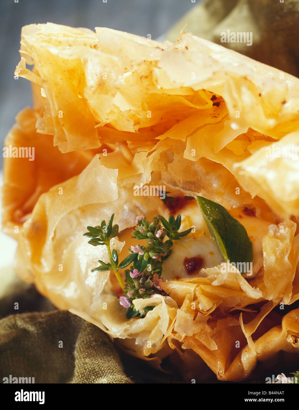 Mozzarella and oregano in filo pastry purse Stock Photo - Alamy