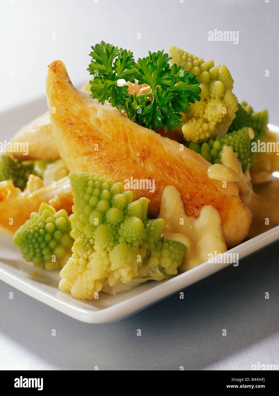 Slivers of chicken with cream sauce Stock Photo - Alamy