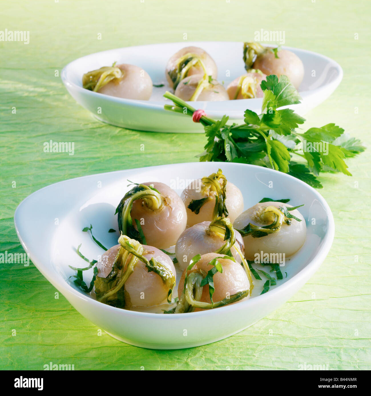 Small turnips with parsley Stock Photo - Alamy