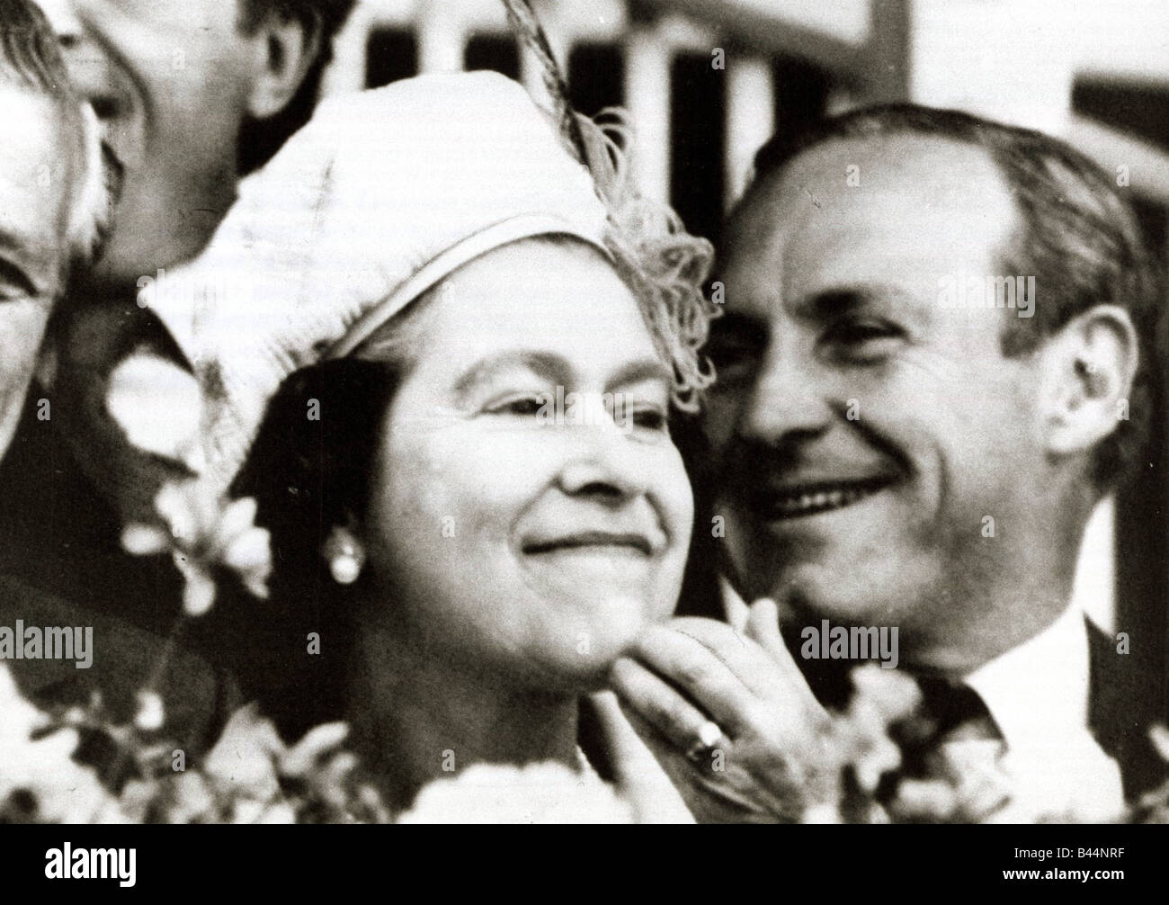 Queen Elizabeth II scratching her chin smiling at Melbourne racecourse ...