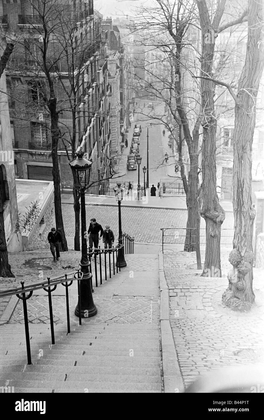 Parisians climb the steps near Montmartre Paris Stock Photo - Alamy