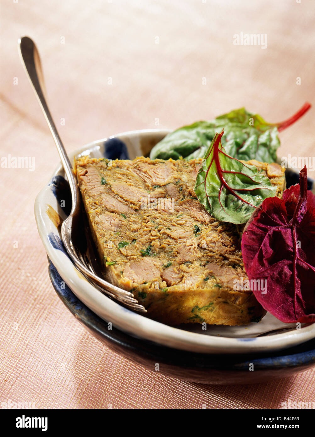 Lamb terrine oriental-style Stock Photo - Alamy