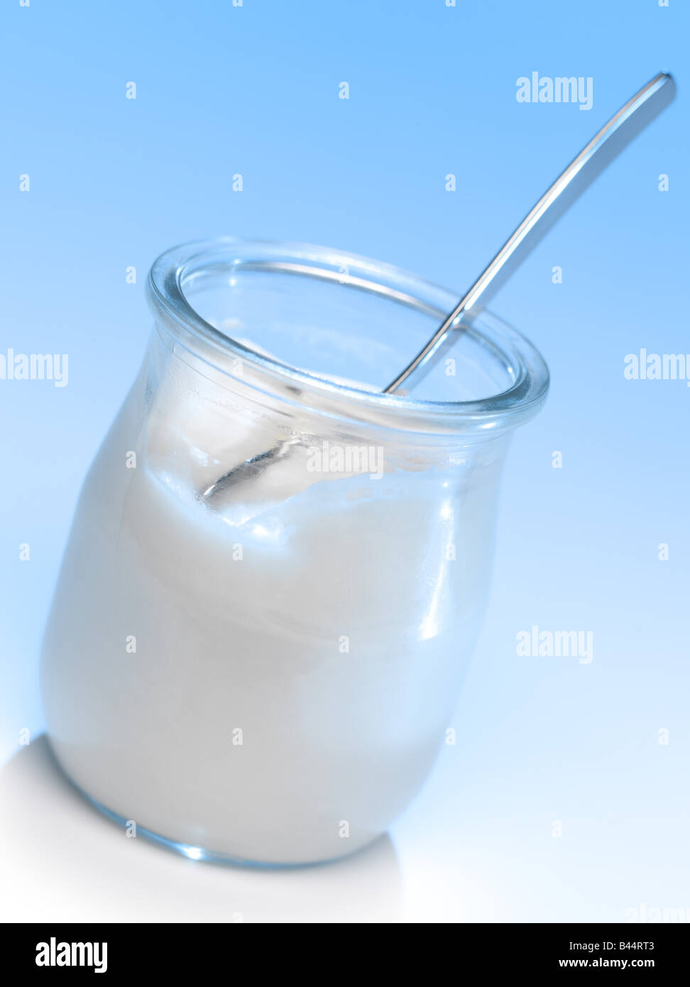 Glass pot of plain yoghurt Stock Photo - Alamy