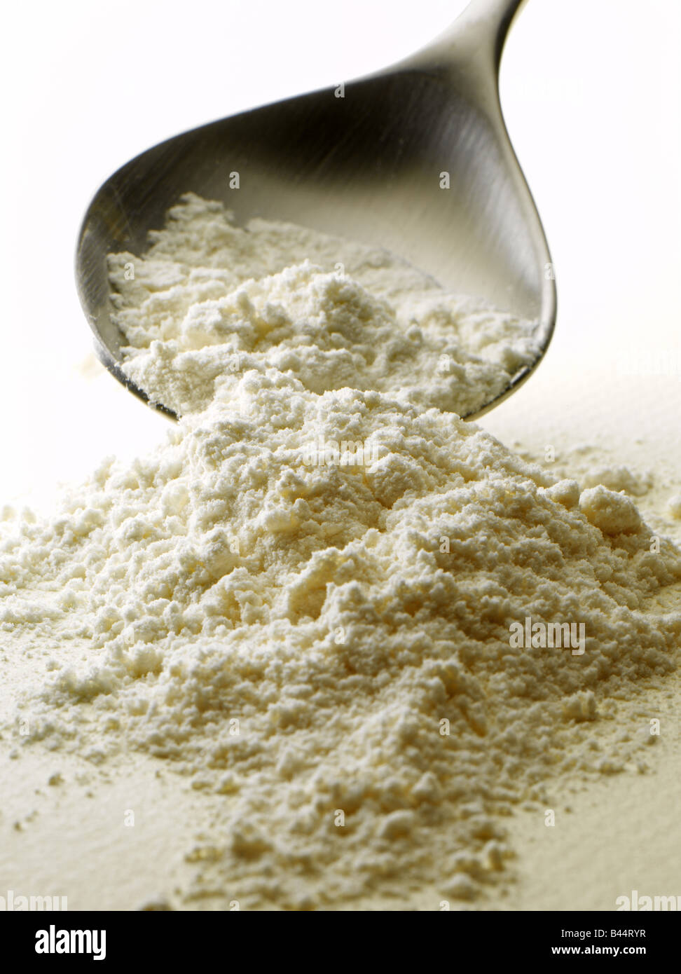 Spoonful of flour Stock Photo - Alamy