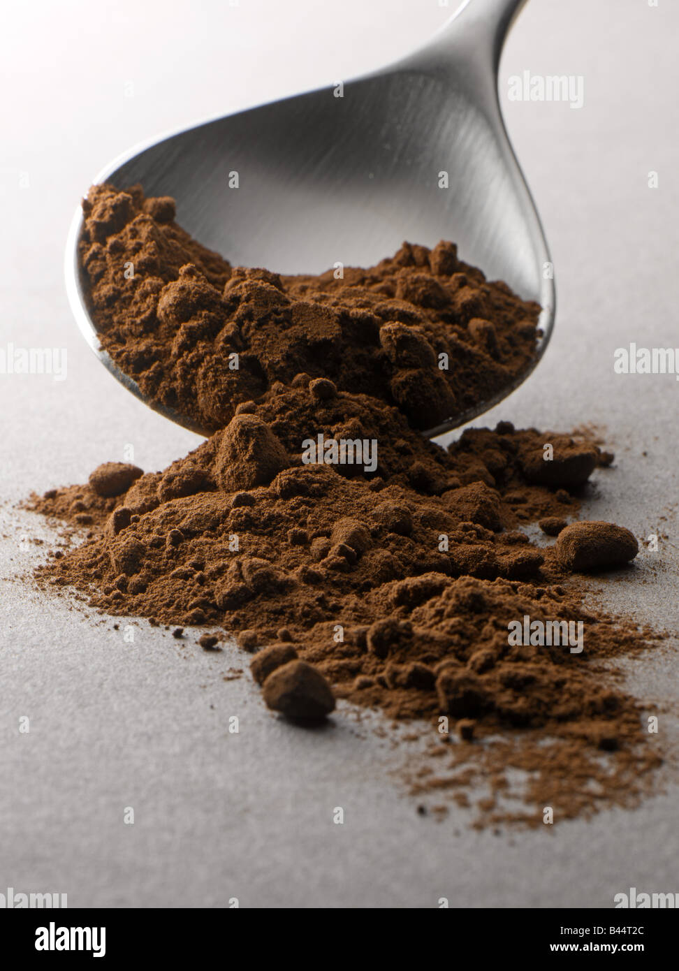 Spoonful of powder cocoa Stock Photo - Alamy