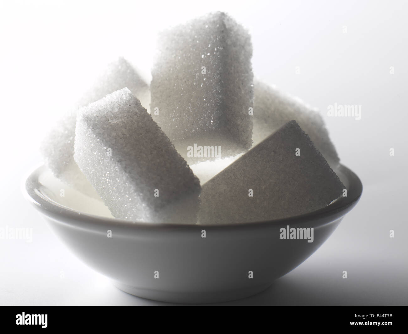 sugar lumps in small dish Stock Photo - Alamy