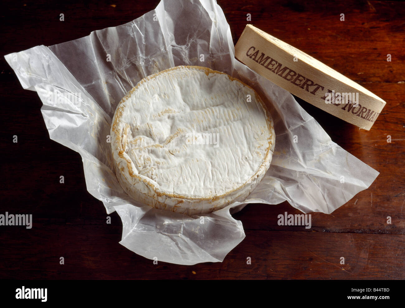 Camembert with wrapping Stock Photo - Alamy