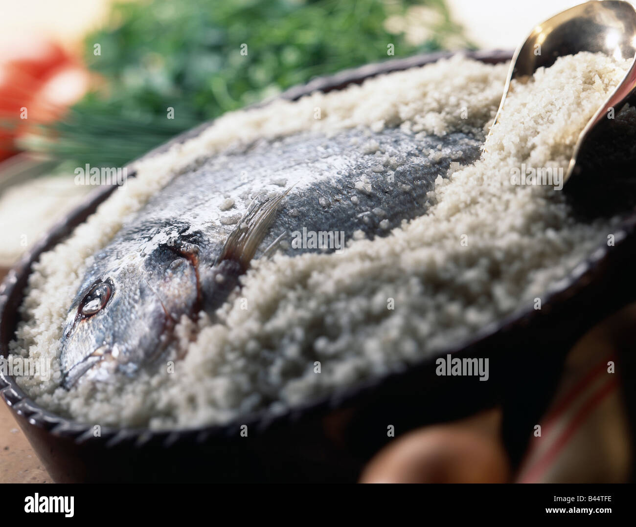 Baked fish salt crust hi-res stock photography and images - Alamy