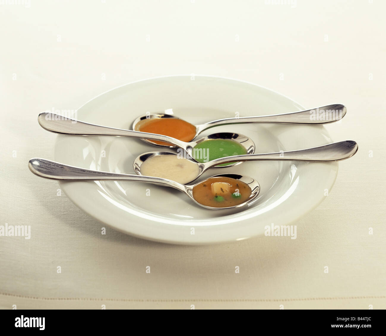 spoonfuls of soup Stock Photo - Alamy