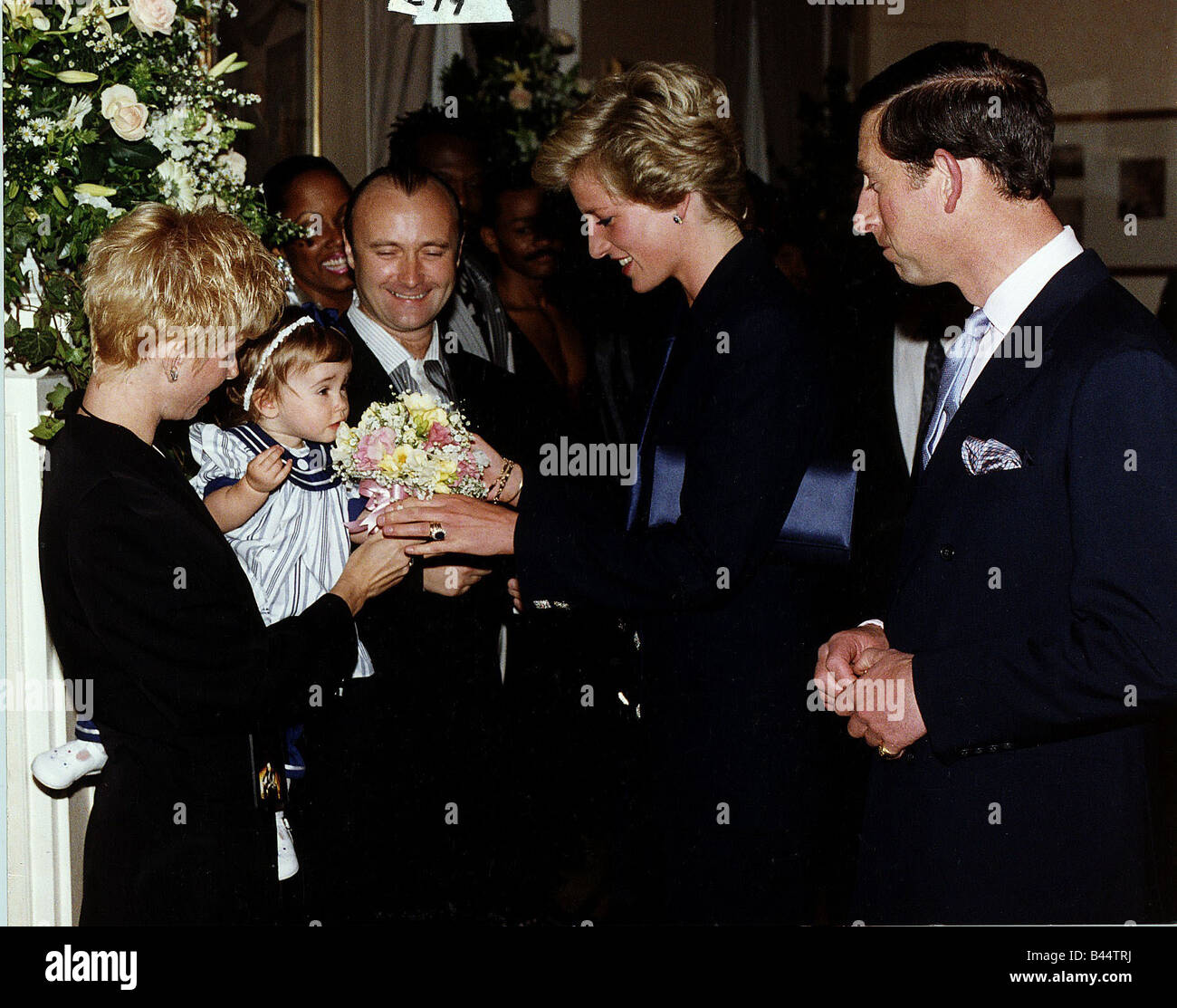 Phil Collins and his family meet Prince Charles and Princess Diana ...