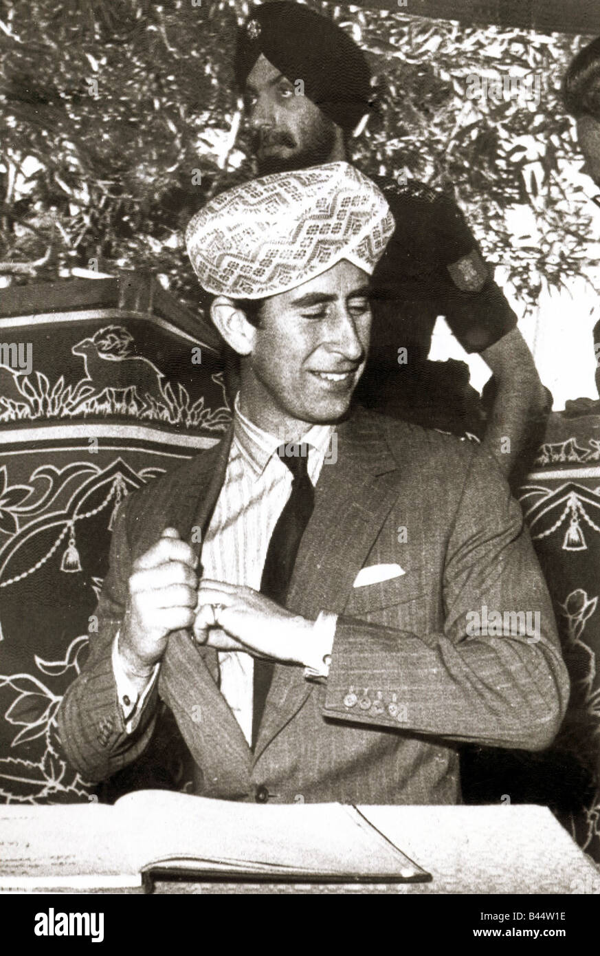 Prince Charles in India 1980 Presented with a golden turban during his ...