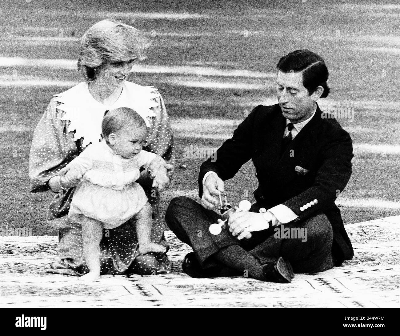 Toddler and parents Black and White Stock Photos & Images - Alamy