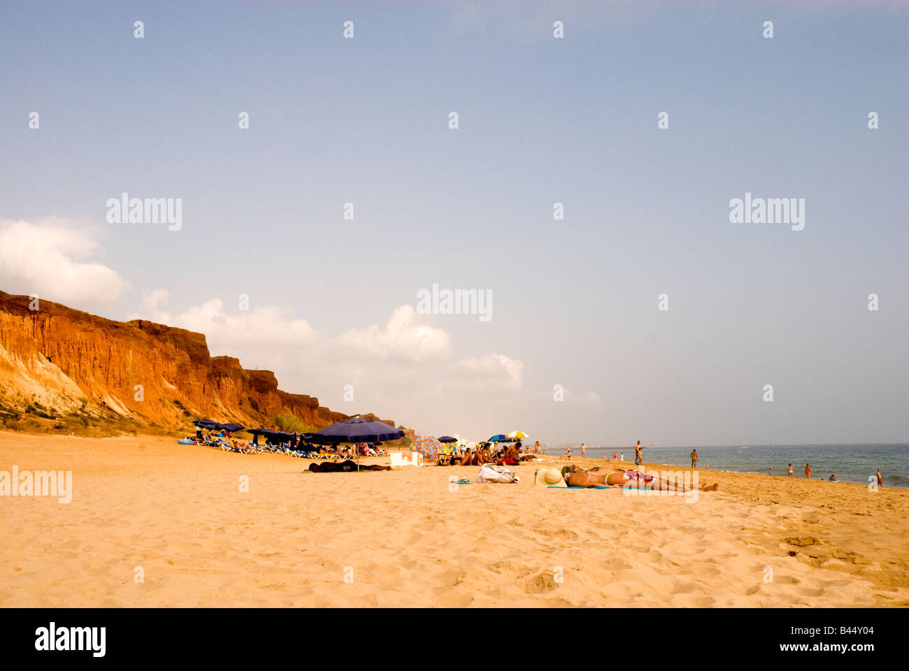 Woman on a sand cliff hi-res stock photography and images - Alamy
