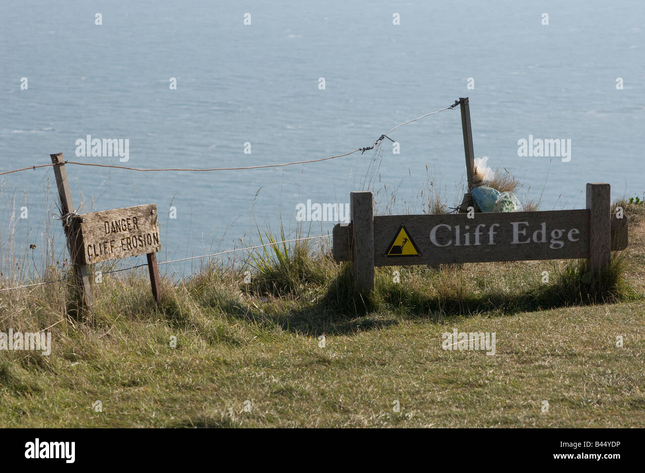 Warning signs on the cliff edge at the notorious Beachy Head suicide ...