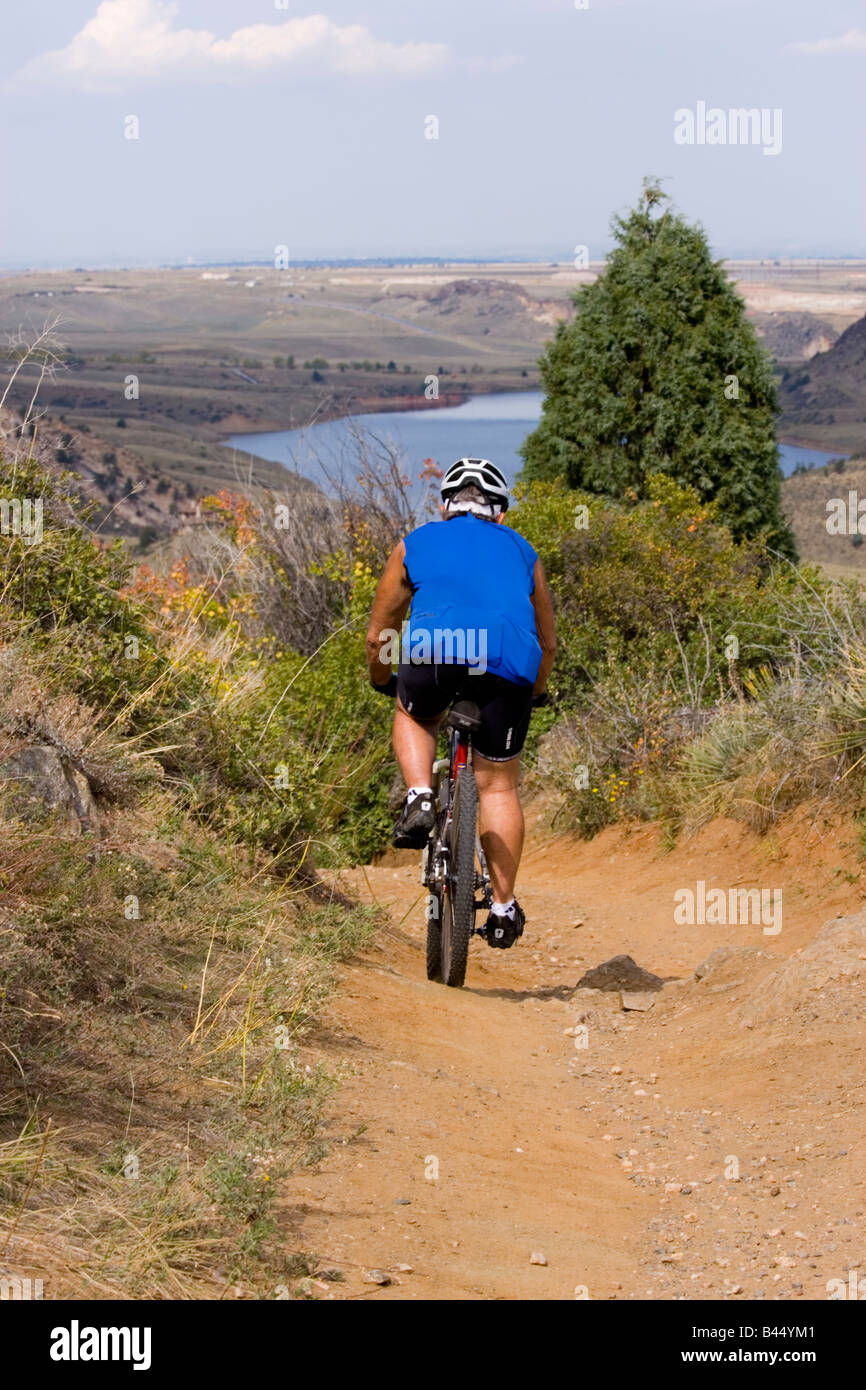 Mountain bikers ride the rugged trails of White Ranch Park near Golden ...