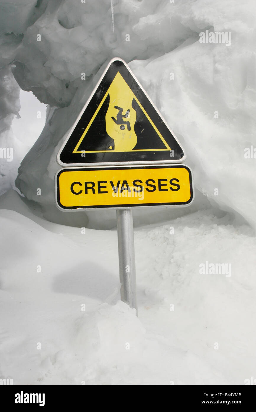 Sign warning of crevasses in the French Alps Stock Photo - Alamy