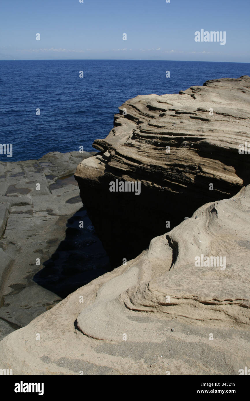 pattern on eroded volcanic rock formation on coast at venotene, italy ...