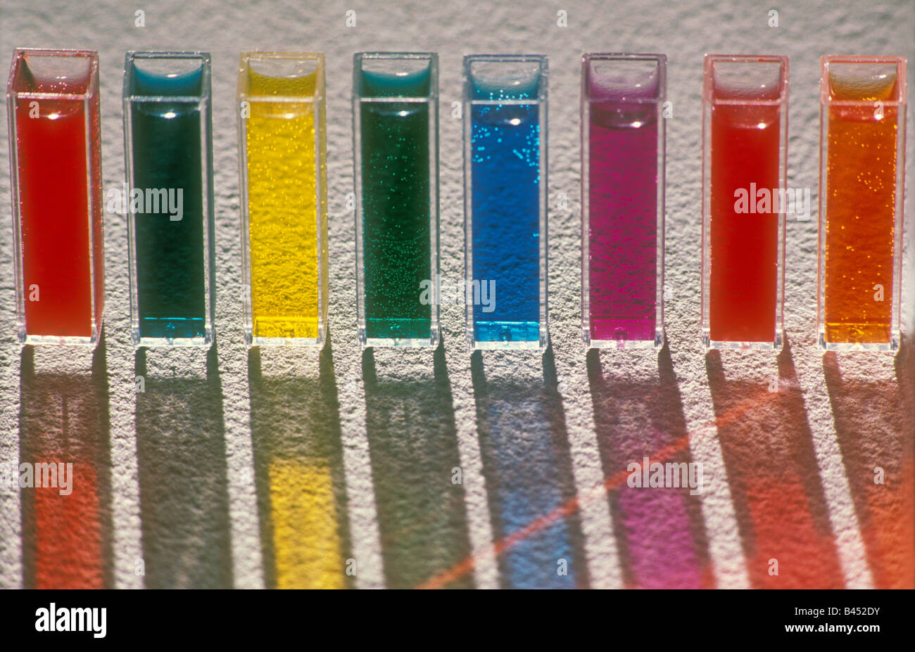 rainbow of dyes in tubes Stock Photo - Alamy