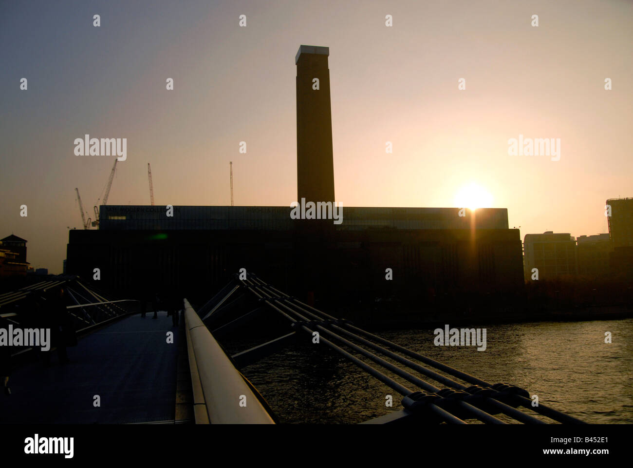 View at sunset of the Tate Modern Gallery from the Millennium Bridge ...