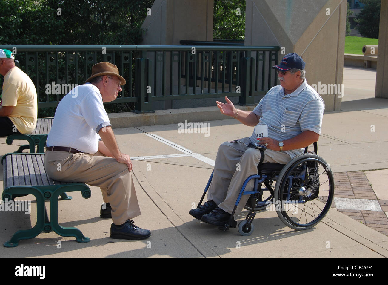 Two old men talking in park hi-res stock photography and images - Alamy
