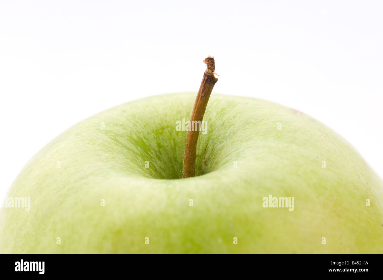 Green apple on a white background Stock Photo - Alamy