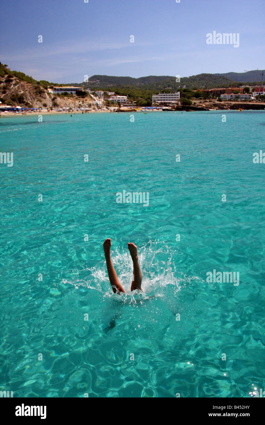 Diving into the water Stock Photo - Alamy